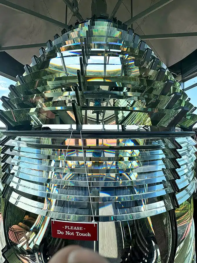 The magnificent Fresnel lens—a masterpiece of 19th-century technology that's essentially a lighthouse's equivalent of prescription glasses for ships.
