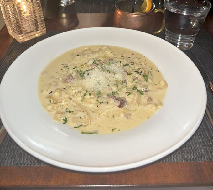 Linguine alla Carbonara that would make an Italian grandmother weep with joy. Silky, rich, and unapologetically indulgent.