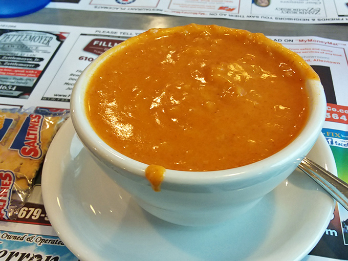 Behold the legendary lobster bisque in all its glory! This unassuming bowl of orange-hued heaven has locals setting calendar reminders for its appearance.