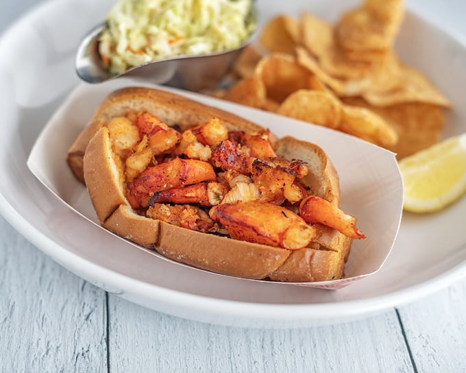 The star of the show: chunks of sweet lobster nestled in a perfectly toasted roll. This isn't just lunch—it's a religious experience worth every mile of the pilgrimage.