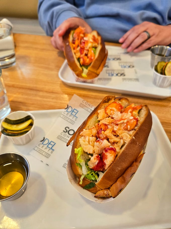 The legendary lobster roll – where sweet, tender chunks of lobster meet buttery toasted perfection. This isn't just lunch; it's a coastal celebration.