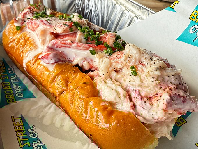 Behold the lobster roll in all its glory—a buttery, toasted vessel cradling sweet chunks of lobster meat so generous they're practically spilling overboard. Worth every mile of the drive.
