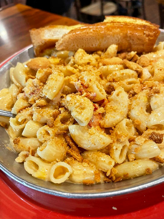Mac and cheese that's had a glow-up! This creamy, crumb-topped masterpiece makes ordinary pasta dishes wave the white flag of surrender.