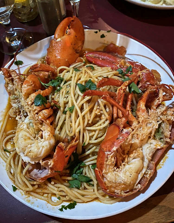 The legendary lobster spaghetti in all its glory—where perfectly al dente pasta dances with sweet chunks of lobster in a sauce worth writing sonnets about.