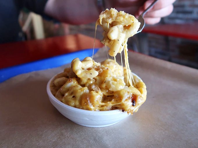 This mac and cheese achieves cheese-pull glory that would make a mozzarella stick jealous – pure Southern comfort.