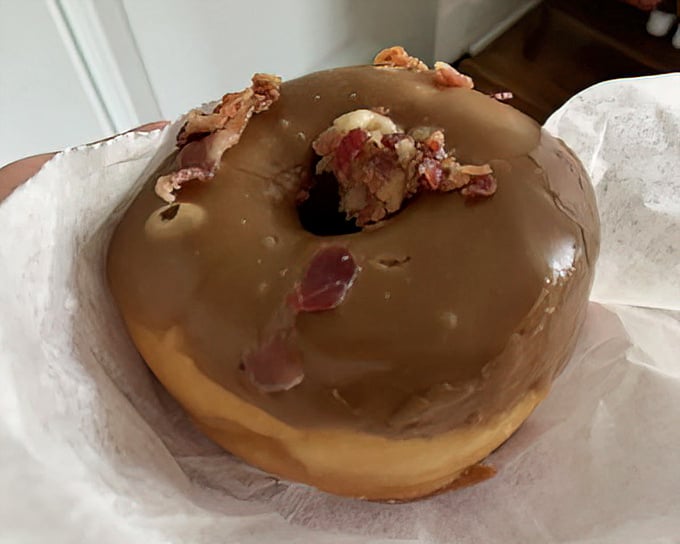 Behold the maple bacon masterpiece—where breakfast meets dessert in perfect harmony. Crispy bacon bits nestled atop maple glaze create a sweet-savory symphony.