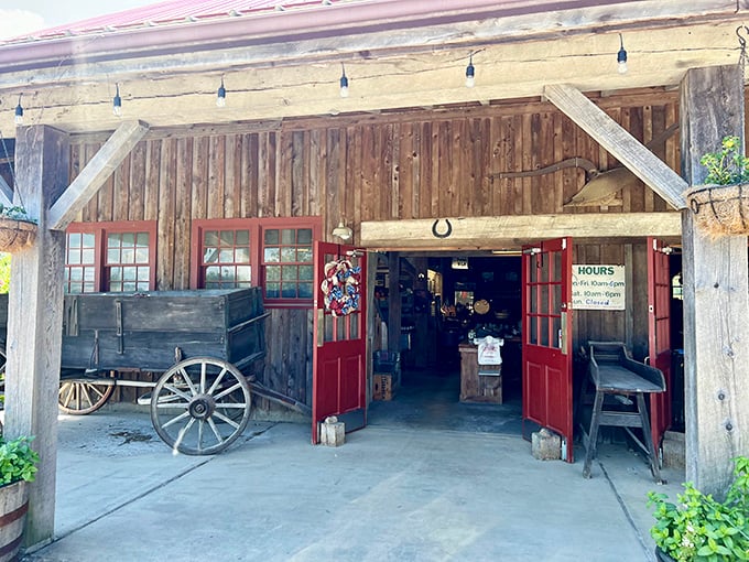 This rustic farm market entrance looks like it was plucked from a Norman Rockwell painting. The wagon wheel isn't decorative—it's autobiographical.