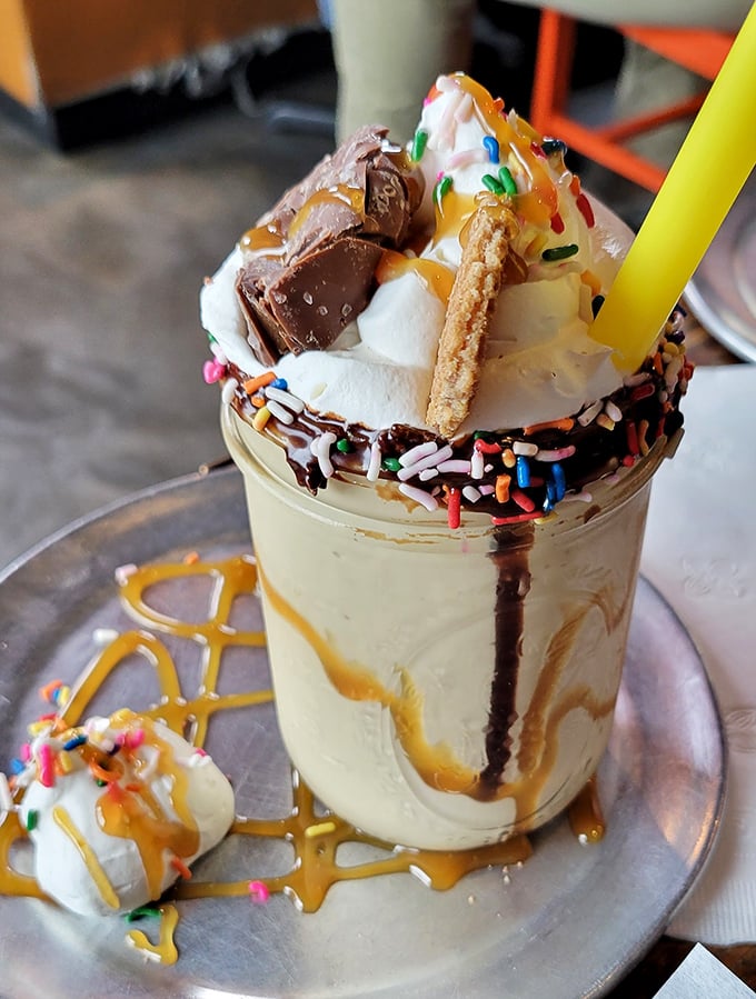 Not so much a milkshake as a dessert skyscraper – complete with whipped cream penthouse and candy condominiums.