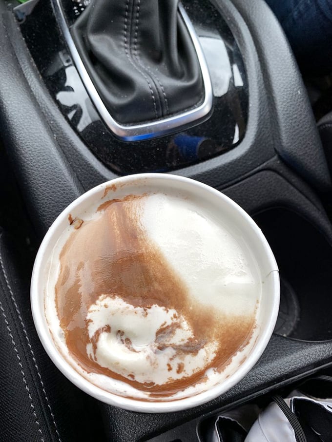 This half-empty milkshake tells a story of restraint that lasted approximately 47 seconds. The chocolate-vanilla swirl is practically a work of art.