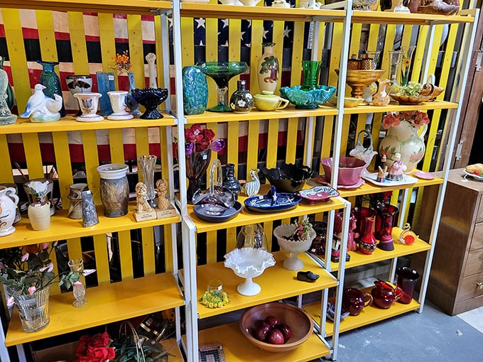 Colorful ceramics and glassware arranged like a mid-century department store display. Your grandmother would recognize every piece—and want them back!