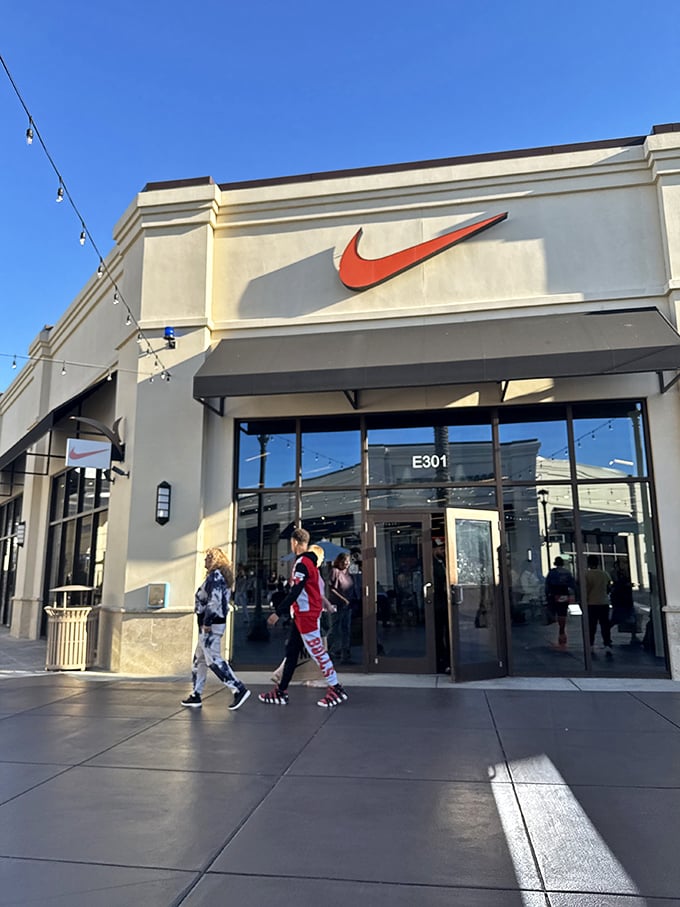 The iconic swoosh beckons shoppers into Nike's temple of athletic wear—where weekend warriors and actual athletes unite in sneaker heaven.