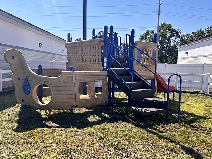 That pirate ship playground keeps little shoppers entertained while parents recover their credit card strength.