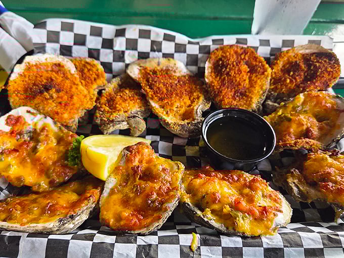 Oysters two ways—broiled with parmesan and baked with cheese. Like choosing between vacation days, there's no wrong answer here.