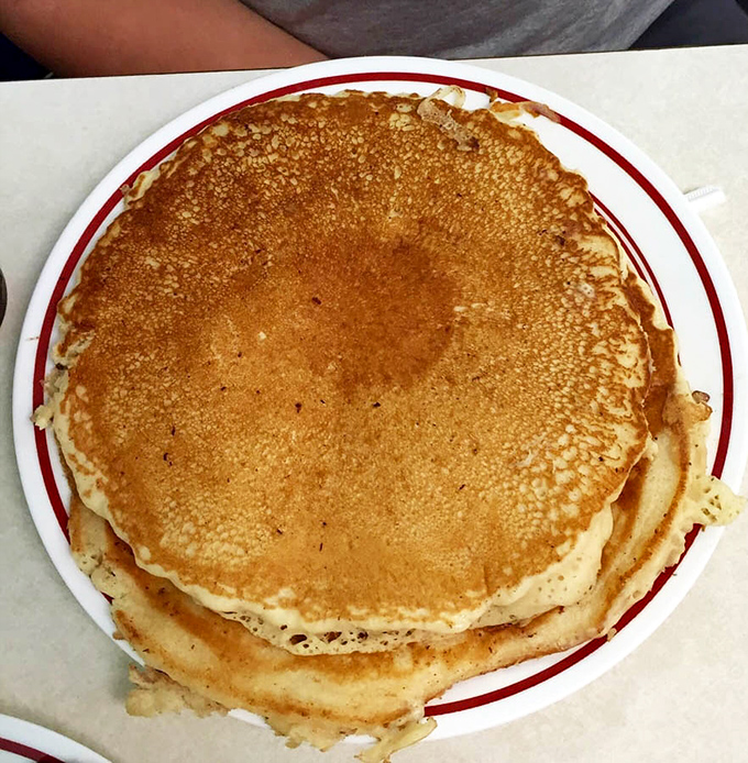 Pancake perfection isn't just about size—it's about that golden exterior giving way to an interior so fluffy it defies gravity.