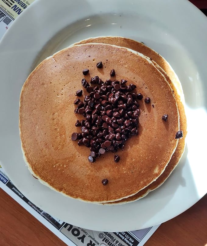 Chocolate chip pancakes that don't just satisfy a sweet tooth—they throw it a full-blown celebration. Breakfast nirvana, served hot.