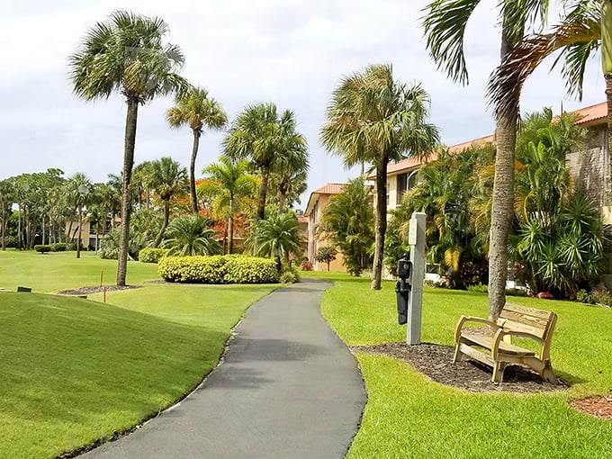 Palm-lined pathways that invite leisurely strolls. The only rush hour here involves golf carts heading to happy hour.