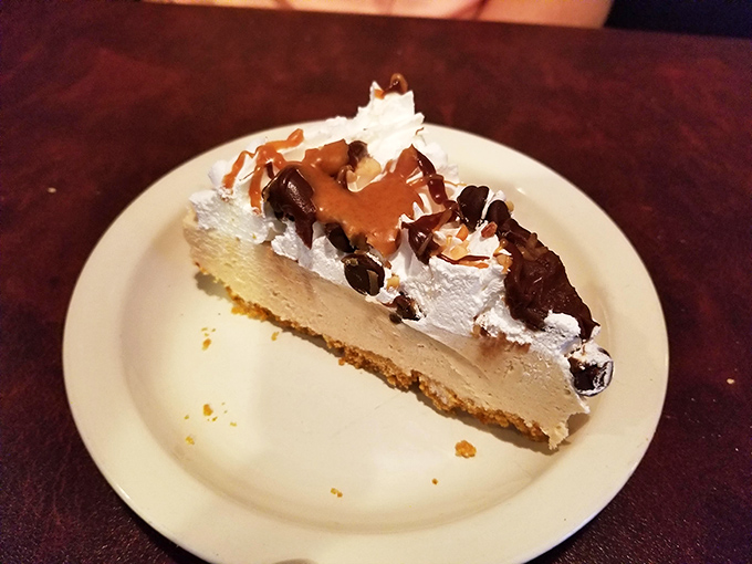 The legendary peanut butter pie—where graham cracker crust meets silky filling in a dessert so good it should require a license.