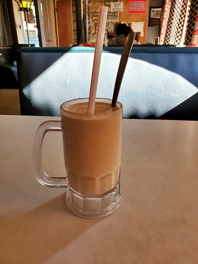 This peanut butter shake isn't just thick—it's the kind that makes your straw stand at attention while your willpower waves the white flag.