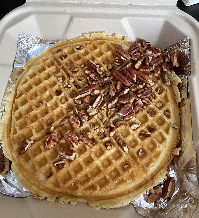The pecan waffle at Ole's isn't just breakfast, it's architecture – a golden foundation supporting those perfectly toasted nuts like delicious roof tiles.