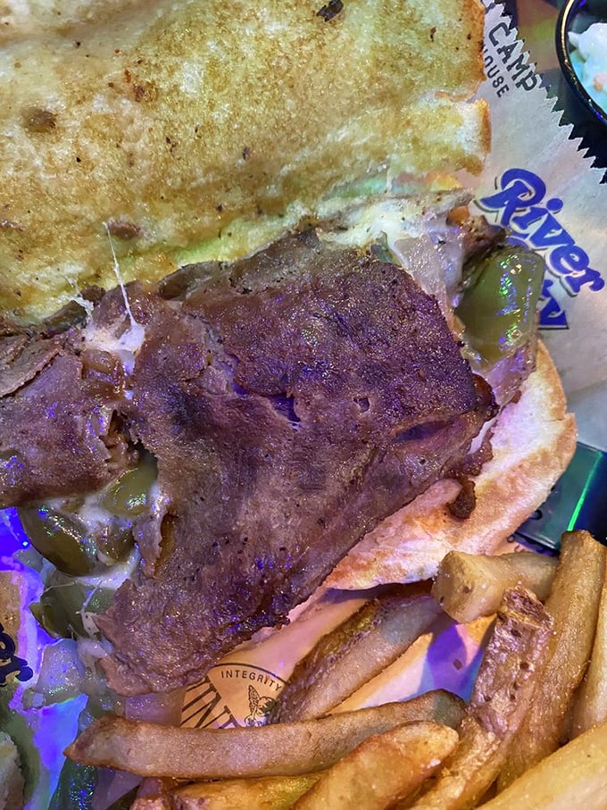 This Philly cheesesteak isn't trying to win beauty contests—it's too busy making people involuntarily close their eyes and mumble "oh my god" between bites.