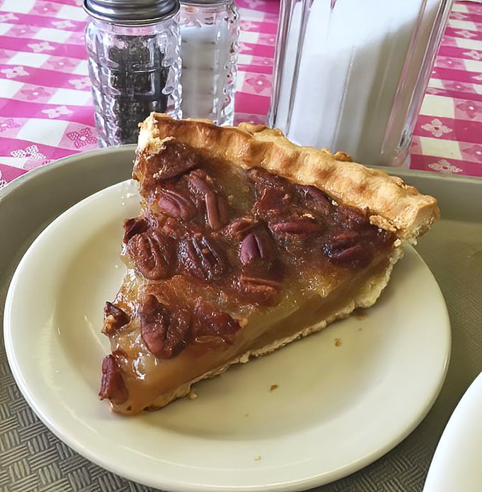 This pecan pie isn't just dessert—it's Georgia's soul on a plate. The perfect ratio of gooey filling to crunchy nuts makes resistance futile.