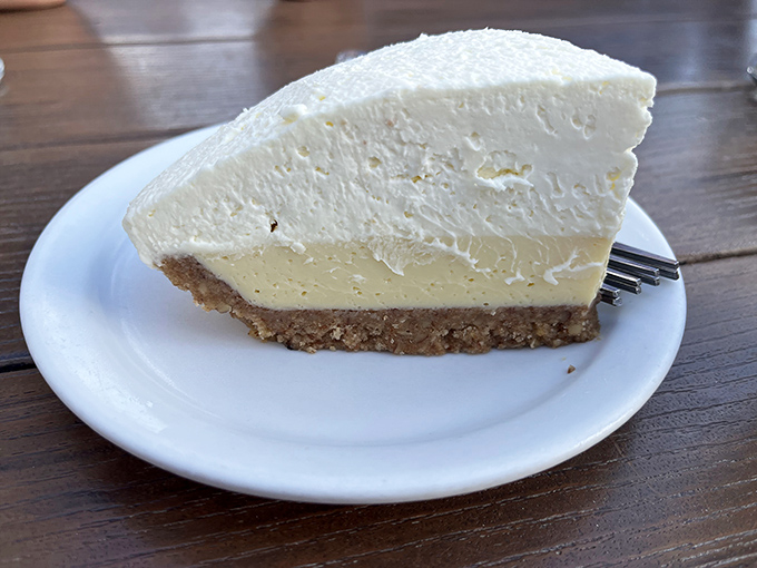 This key lime pie isn't just dessert; it's a religious experience. Creamy, tart perfection on a graham cracker throne worthy of pilgrimage.