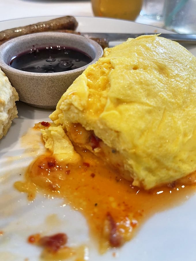 This pimento cheese omelet doesn't just ooze—it performs a slow, sensual dance across the plate that would make any cheese lover weak at the knees.