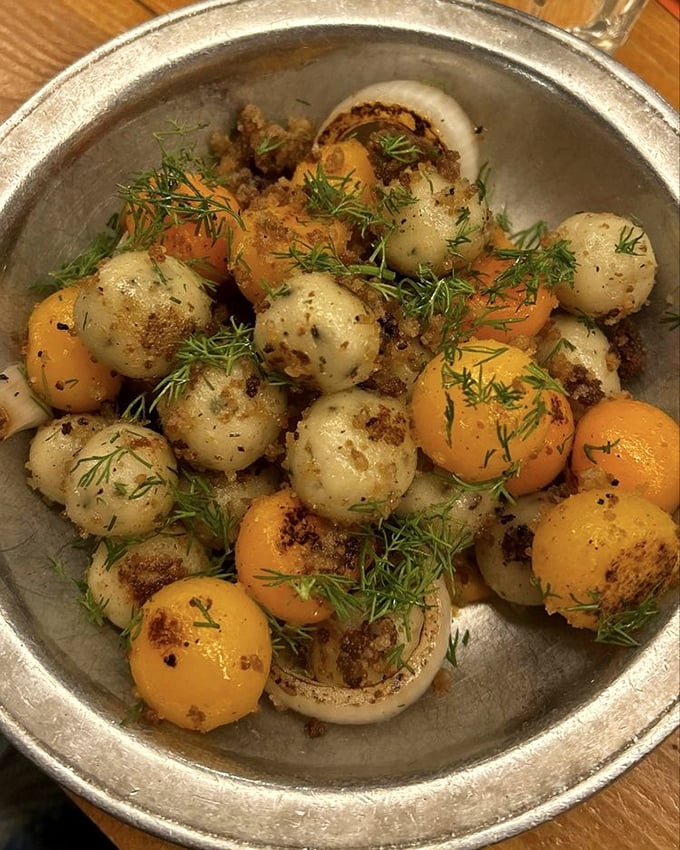 These golden potato dumplings with fresh dill could convert even the most dedicated carnivore—proof that potatoes might be Earth's perfect food after all.