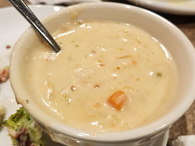Behold the legendary potato soup in all its creamy glory! Chunks of tender potato swimming in velvety broth—this isn't just soup, it's a warm hug in a bowl.