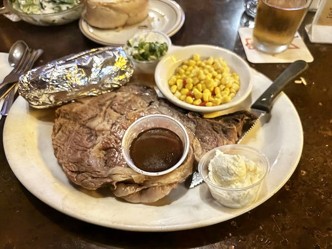 Prime rib that doesn't need a fancy steakhouse setting to shine. That au jus cup isn't just a condiment—it's liquid gold.