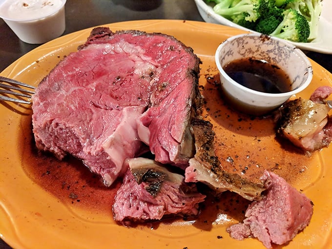 Behold the crown jewel – prime rib so perfectly pink and tender, it practically melts before your fork even touches it.