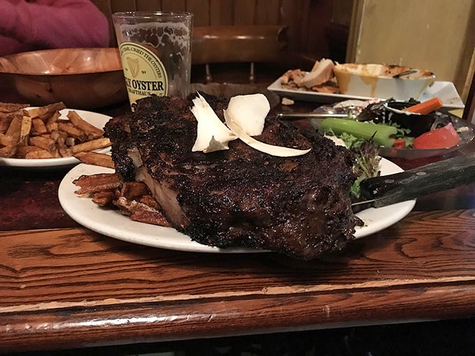 Behold the prime rib—a carnivore's dream so perfectly executed it should come with its own standing ovation and a tiny top hat.