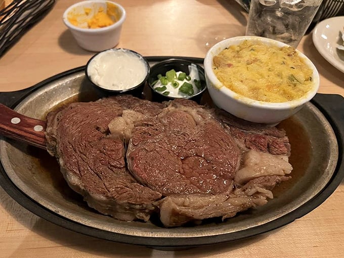 Behold the star of the show—prime rib so perfectly cooked it makes vegetarians question their life choices, accompanied by a potato that's living its best life.