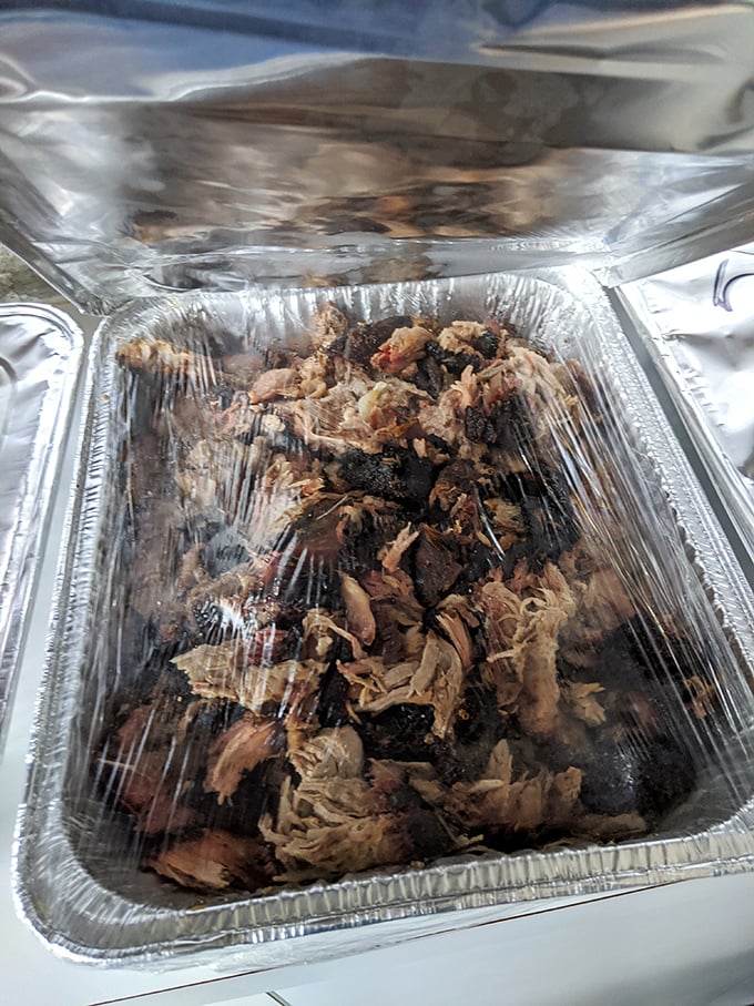 Behold the star of the show: pulled pork in its natural habitat. That bark-to-meat ratio is what BBQ aficionados dream about at night.