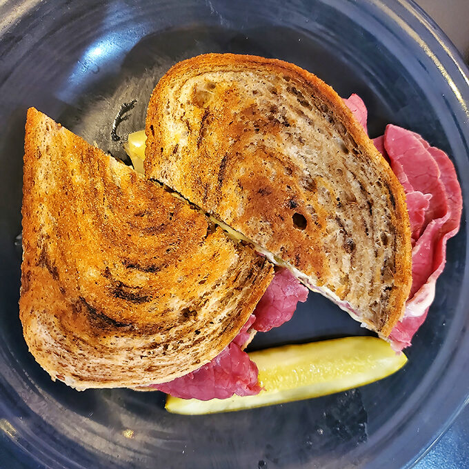 A proper Reuben doesn't need fancy tricks—just perfectly toasted rye, melty cheese, and corned beef that makes you question all other sandwiches you've ever loved.