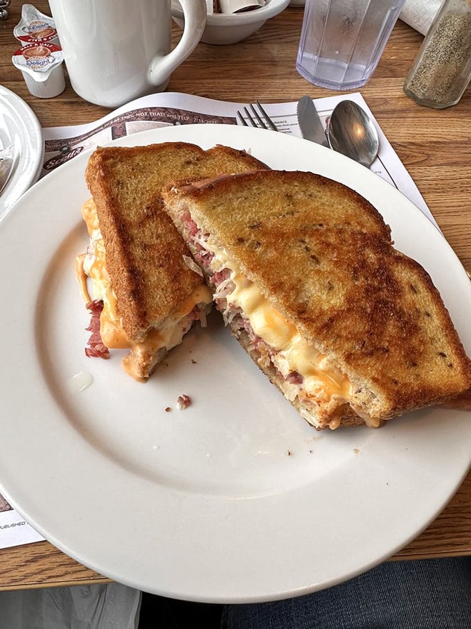 The Reuben at Scott's doesn't just satisfy hunger – it resolves existential crises. That golden grilled marble rye is practically winking at you.