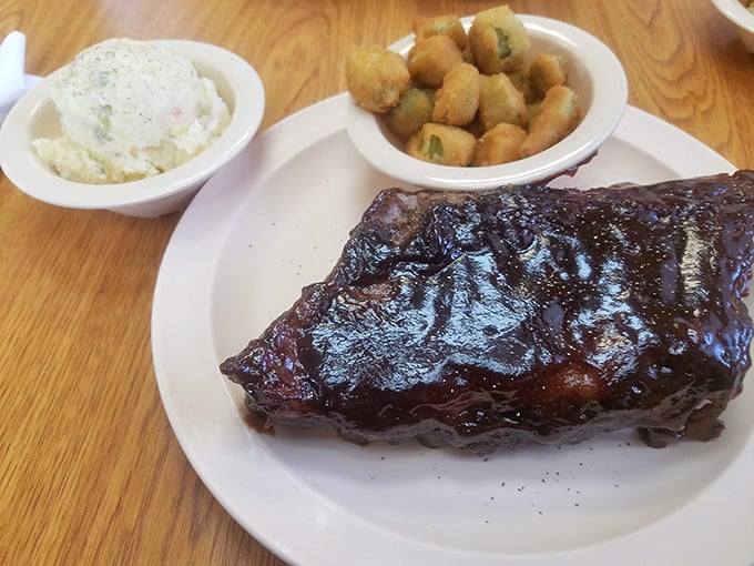 These ribs don't need a fancy introduction – they're the kind of soul-satisfying barbecue that makes conversation impossible except for appreciative mumbling.