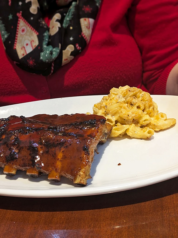 These ribs don't need a fancy introduction—they're the barbecue equivalent of a perfect sunset, paired with mac and cheese that's equally swoon-worthy.
