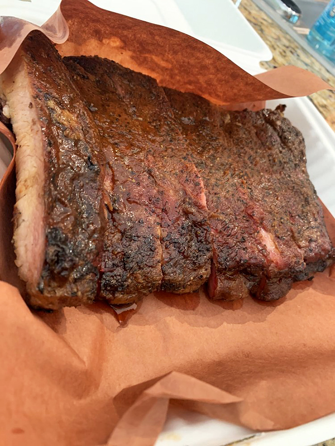 These beef ribs demand respect, two hands, and maybe a construction permit for structural engineering marvels.