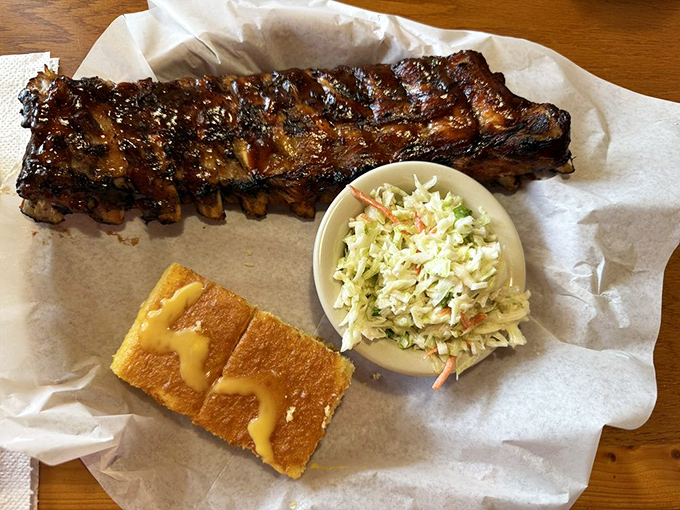 These aren't just ribs; they're edible evidence that patience is a virtue. The glistening bark tells you everything you need to know before the first bite.
