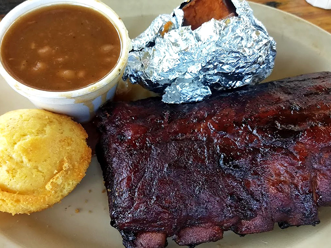 These ribs don't just fall off the bone—they practically leap into your mouth. That smoke ring isn't just color; it's a badge of barbecue honor.