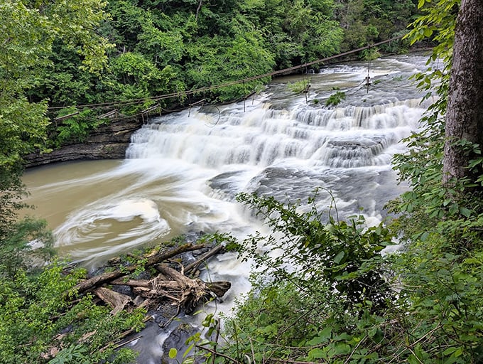 Where the waterfall meets the river basin – that magical intersection where thundering power transforms into serene pools.