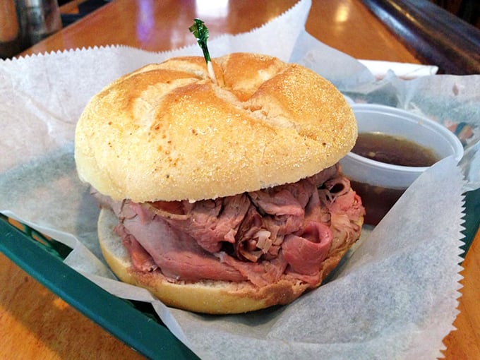 The star of the show in all its glory – hand-carved roast beef piled high on a perfect roll with au jus standing by for dunking duty.