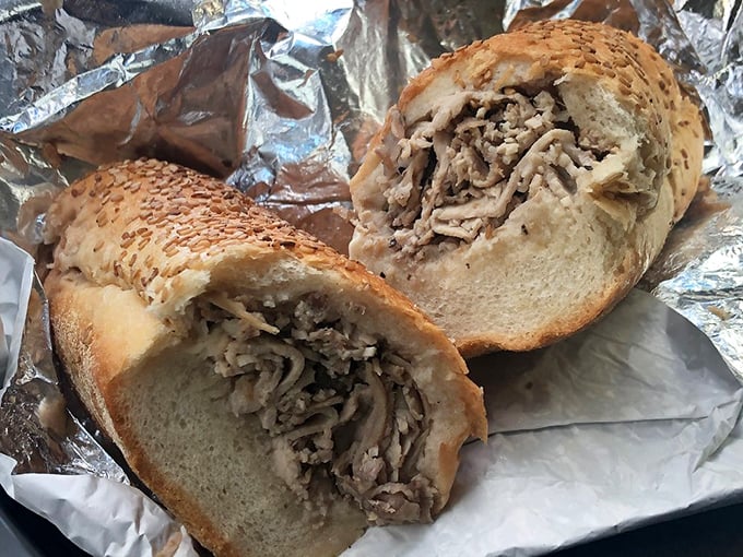 Behold the roast pork sandwich that makes grown adults reconsider their life priorities with every magnificent bite.
