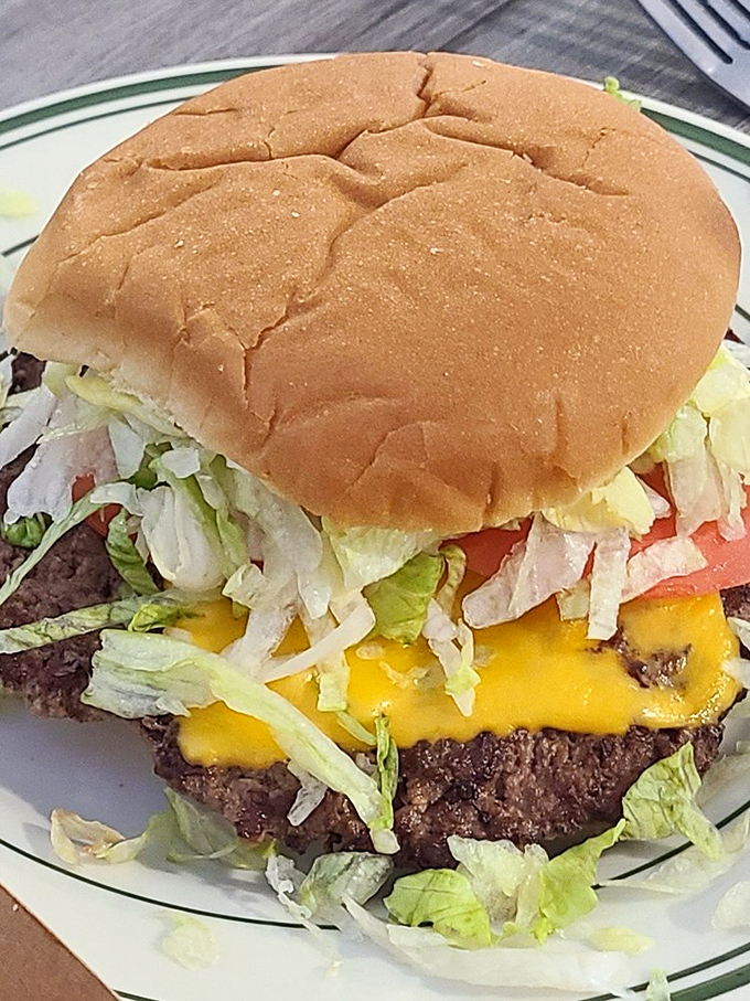Behold the legendary Rod Burger in all its glory—where the cheese melts just right and the patty has that perfect crust that makes burger aficionados weak in the knees.