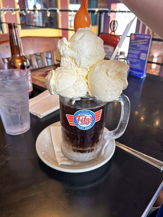 Behold the crown jewel: Fitz's legendary root beer float, where creamy vanilla ice cream meets spicy-sweet root beer in a frosty mug of pure Missouri magic.