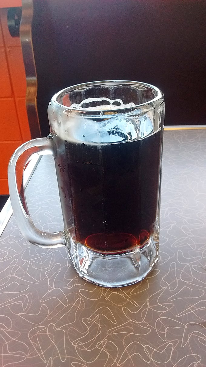 Liquid nostalgia in a frosty mug. Jolly's root beer isn't just a beverage – it's a time machine that takes you back to simpler days with every sip.