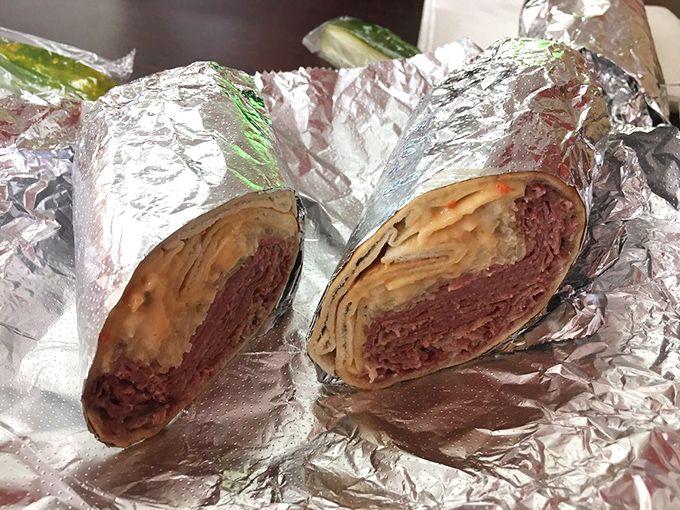 Behold the star of our show—layers of corned beef, sauerkraut, and Swiss cheese wrapped in warm flatbread. Poetry you can eat.
