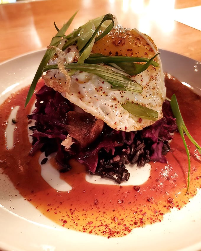 Behold the legendary Sakura Pork Belly – a masterpiece of tender meat, vibrant purple cabbage, and that perfectly runny egg that dreams are made of.