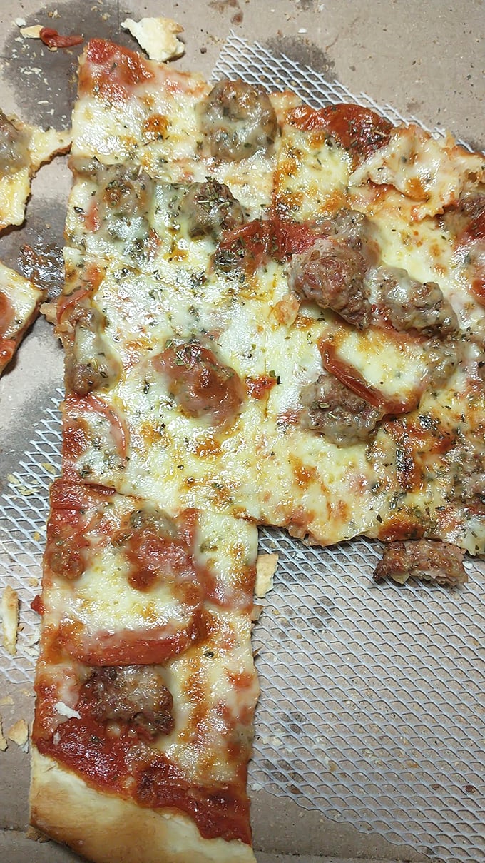 Pizza perfection doesn't happen by accident. This sausage-studded masterpiece proves that sometimes more is exactly enough.
